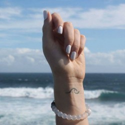 20 Powerful Wave Tattoos